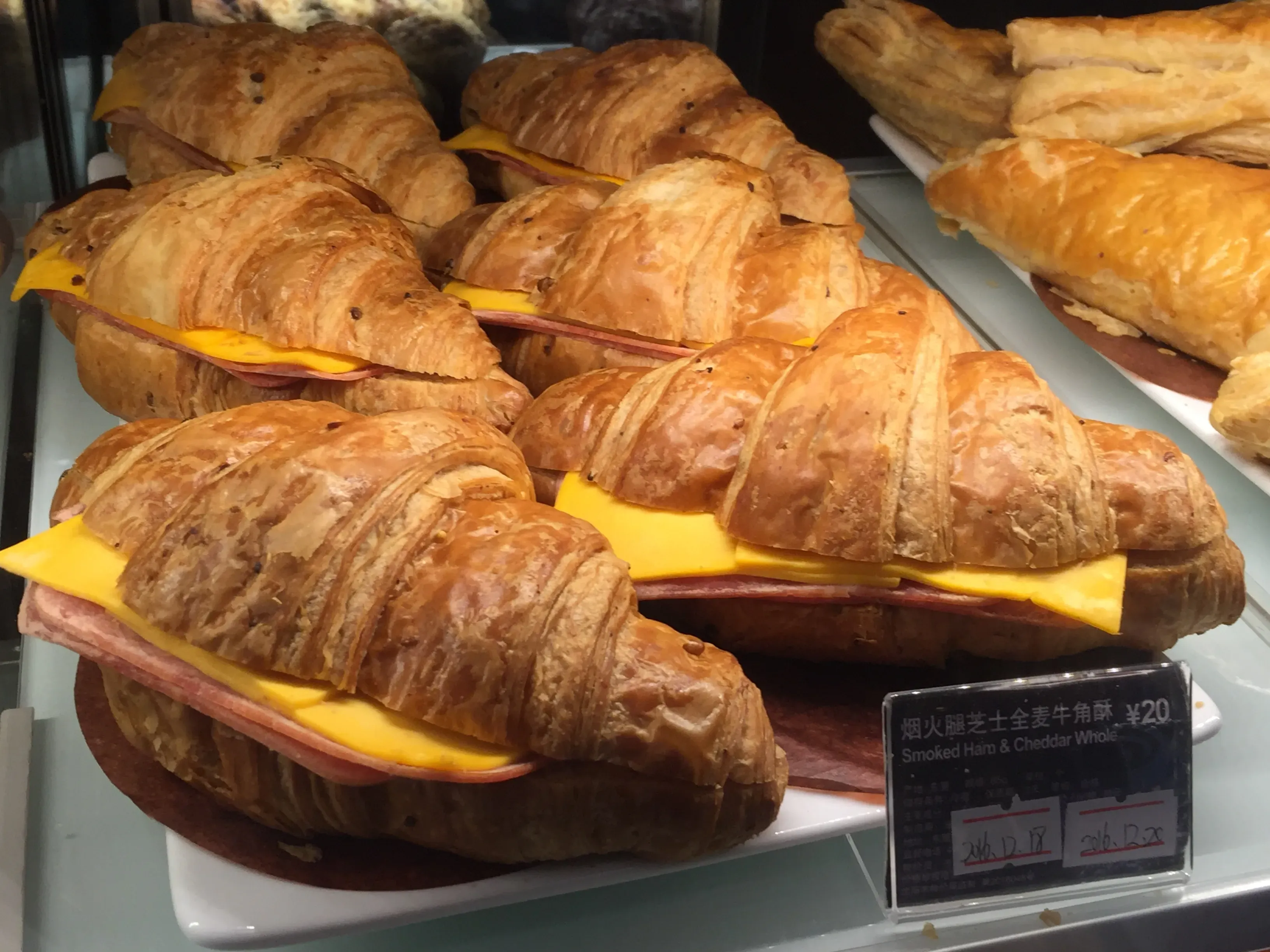 Smoked ham and cheddar cheese croissants for the price a meal in China